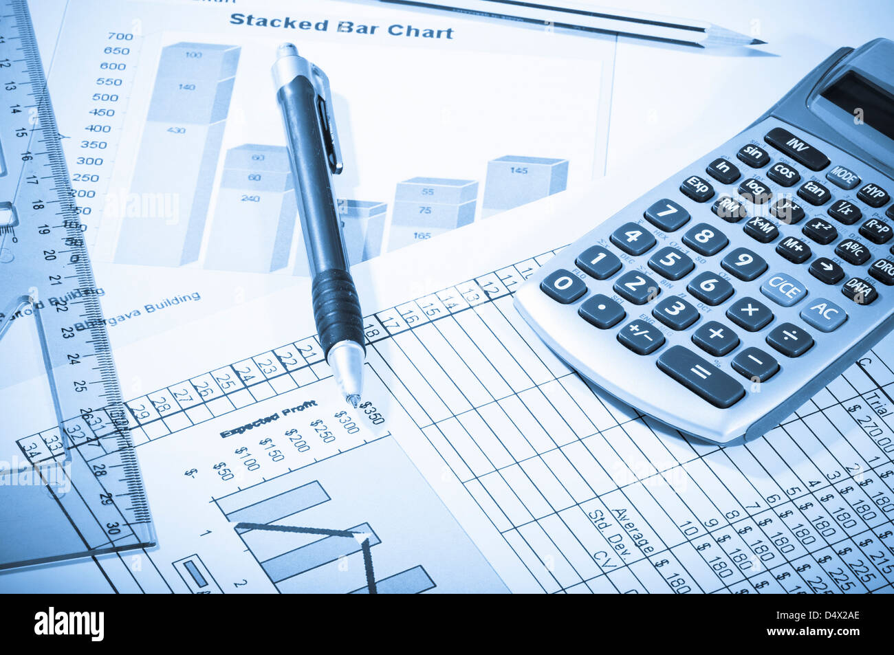 Calculator and spread sheet Stock Photo - Alamy