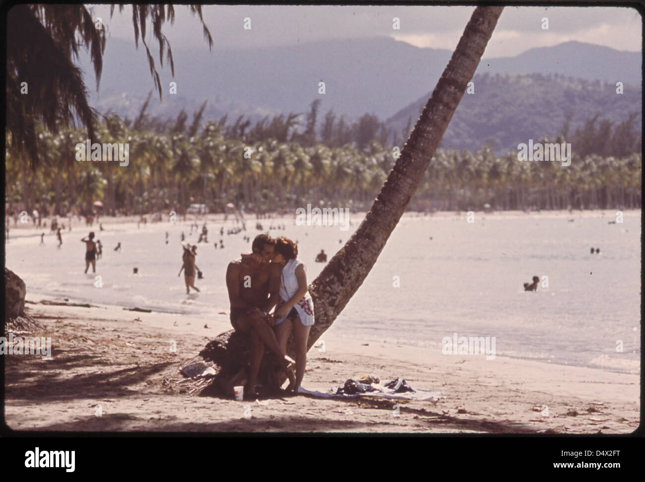 A photograph from February 1973 shows Luguillo Beach in Puerto Rico, capturing its natural ...