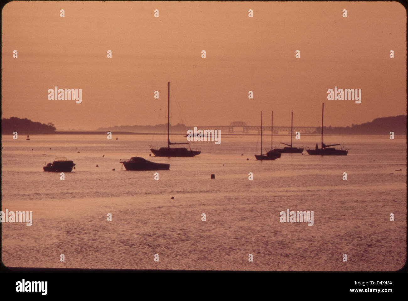 This 1973 photograph shows a view of Boston Harbor with Squantum in the ...