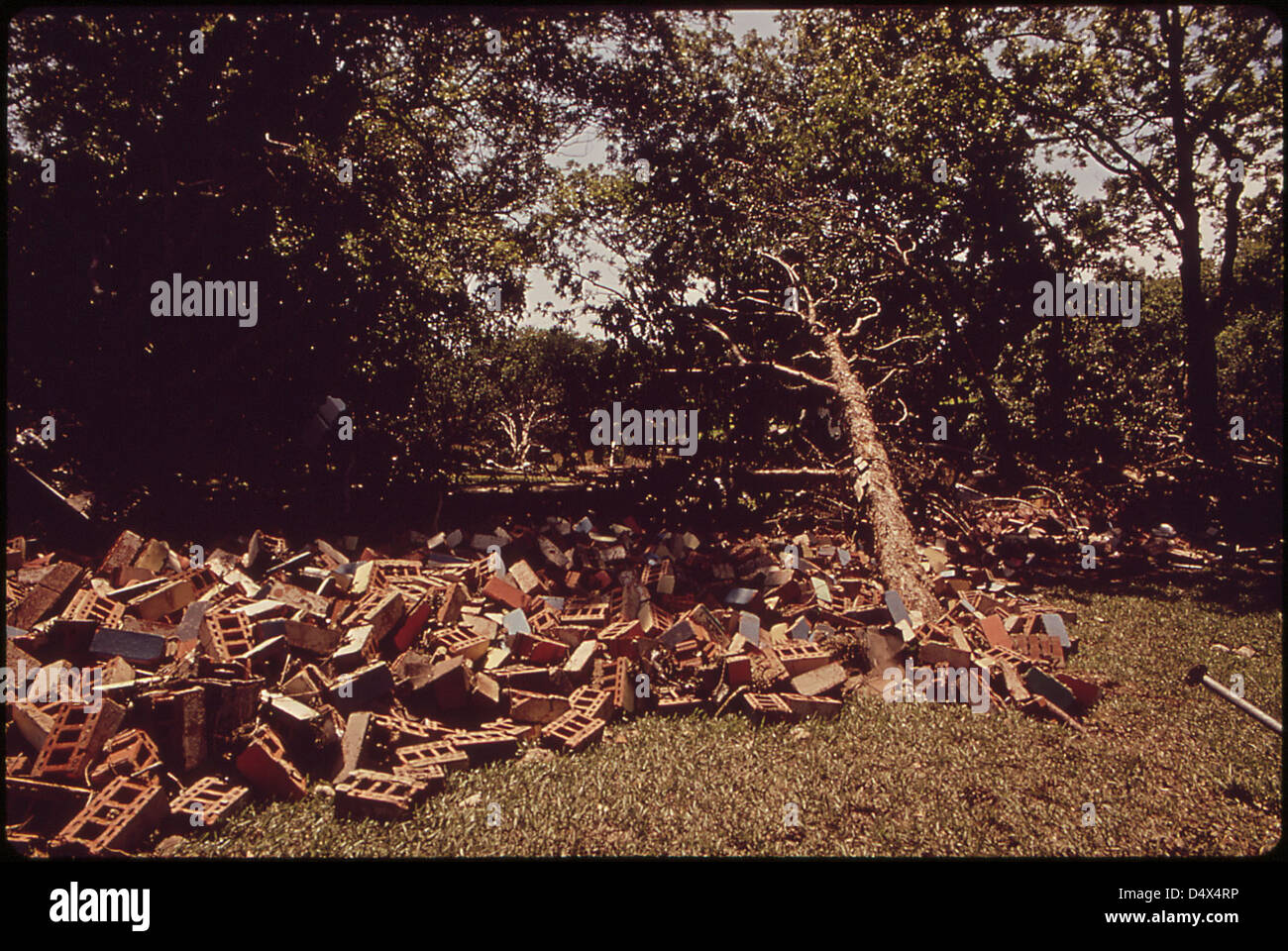 A photograph documenting river flood damage, showcasing the destructive ...