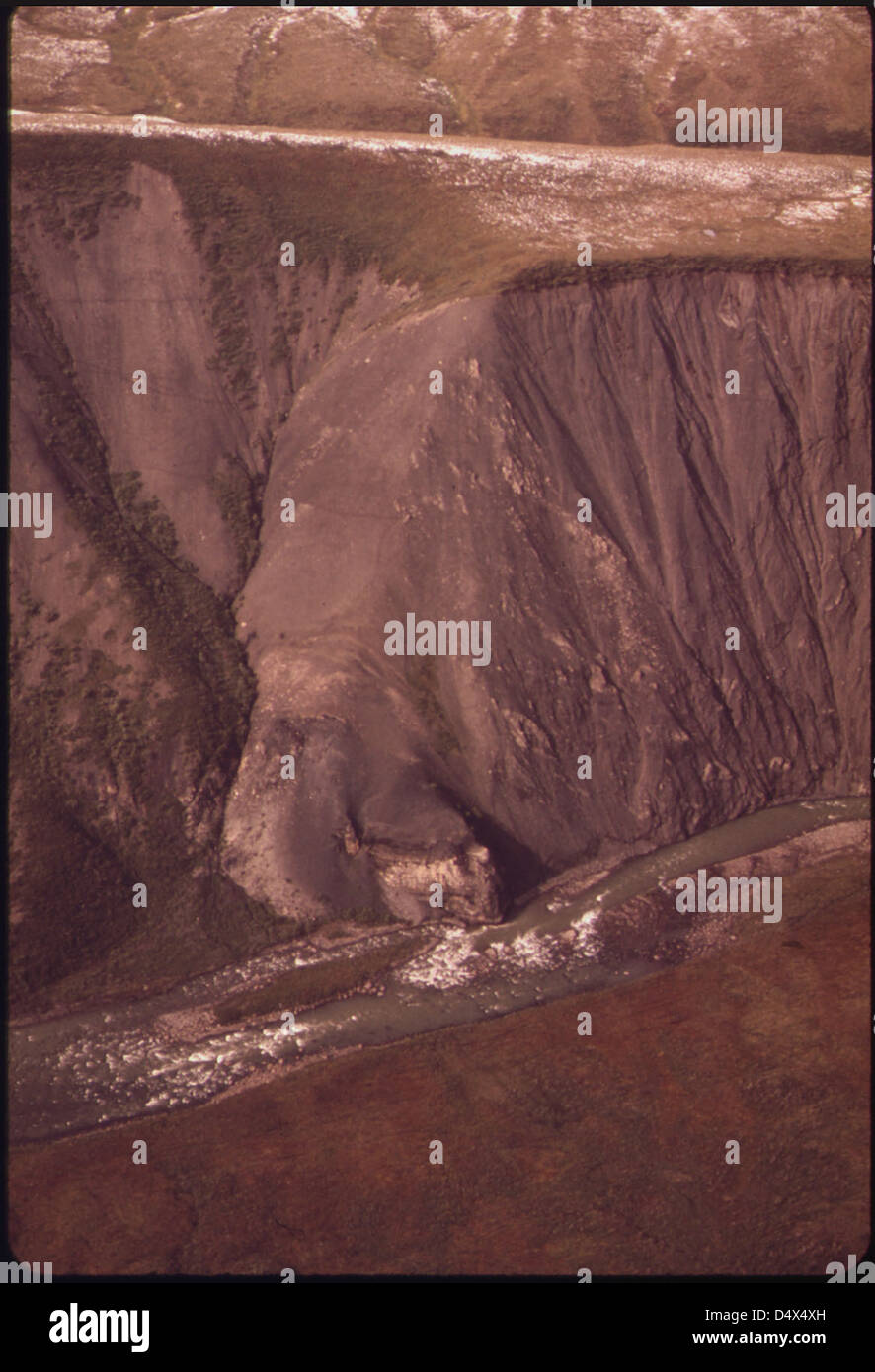 This 1973 photograph shows the Atigun Gorge, with a view looking north ...