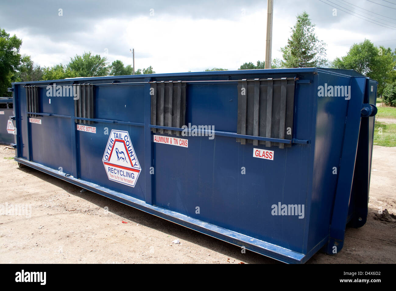 Divided recycling bin for glass, aluminum and tin, plastic bottles and ...