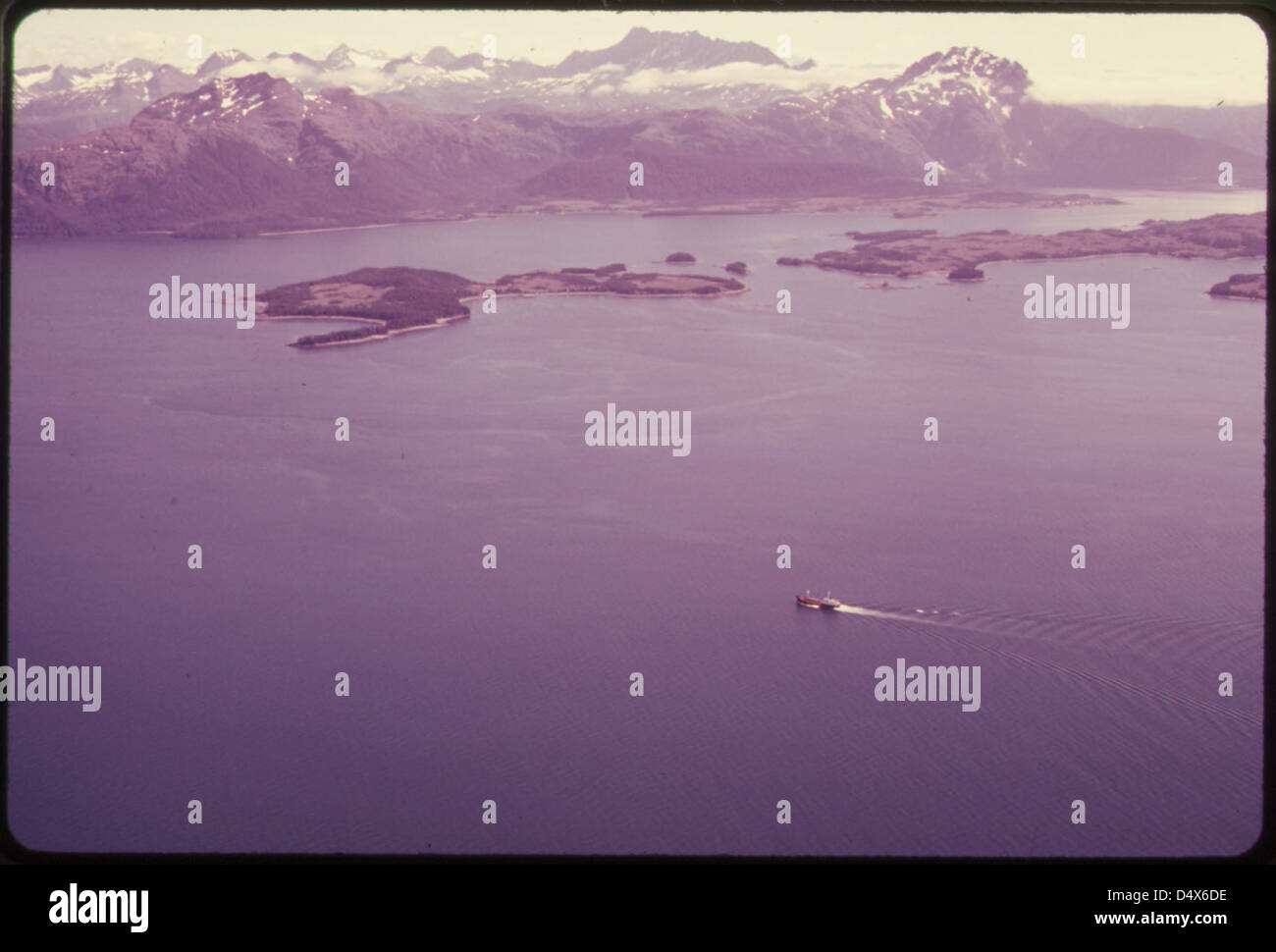 This 1974 photograph shows the tanker 'Alaska Standard,' a small, old ...