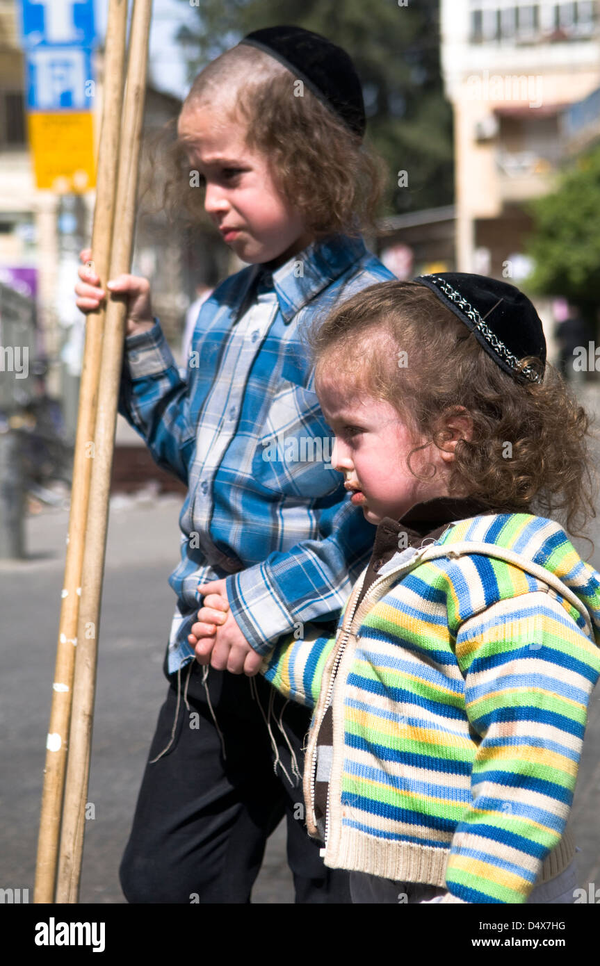 Orthodox Jewish boys burning bread and Chametz as part of the ...