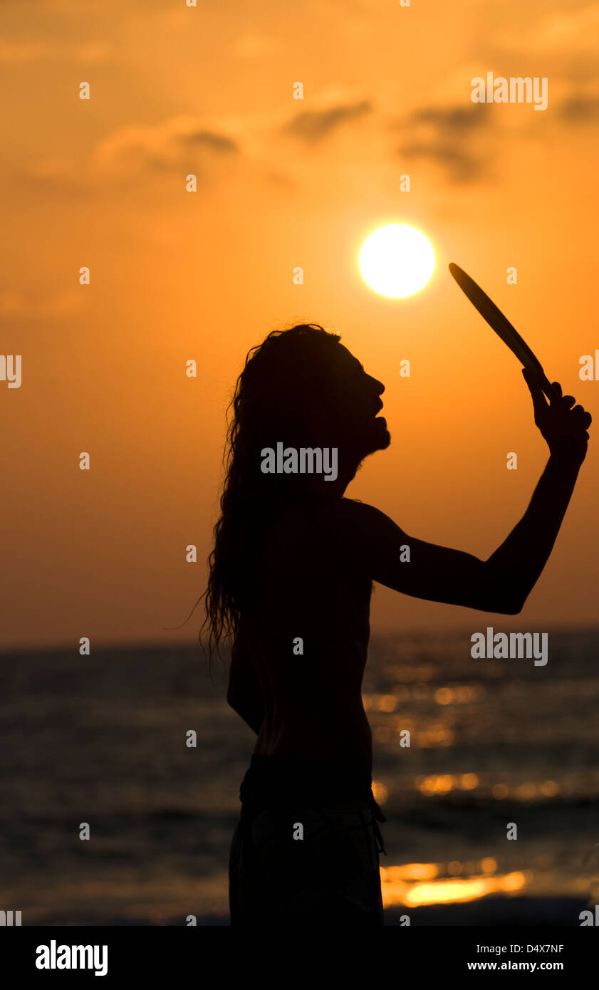 Israelis playing Matkot ( beach paddle ball ) on the beach in Tel-Aviv ...