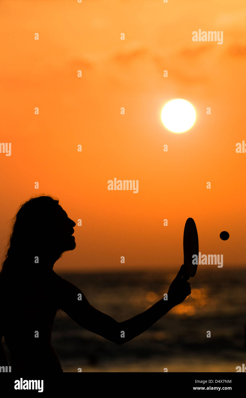Israelis playing Matkot ( beach paddle ball ) on the beach in Tel-Aviv ...