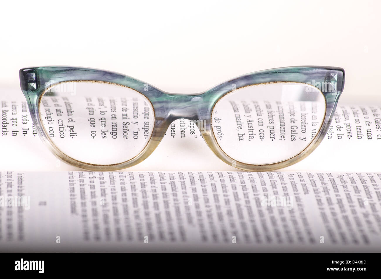 book and glasses on table Stock Photo - Alamy