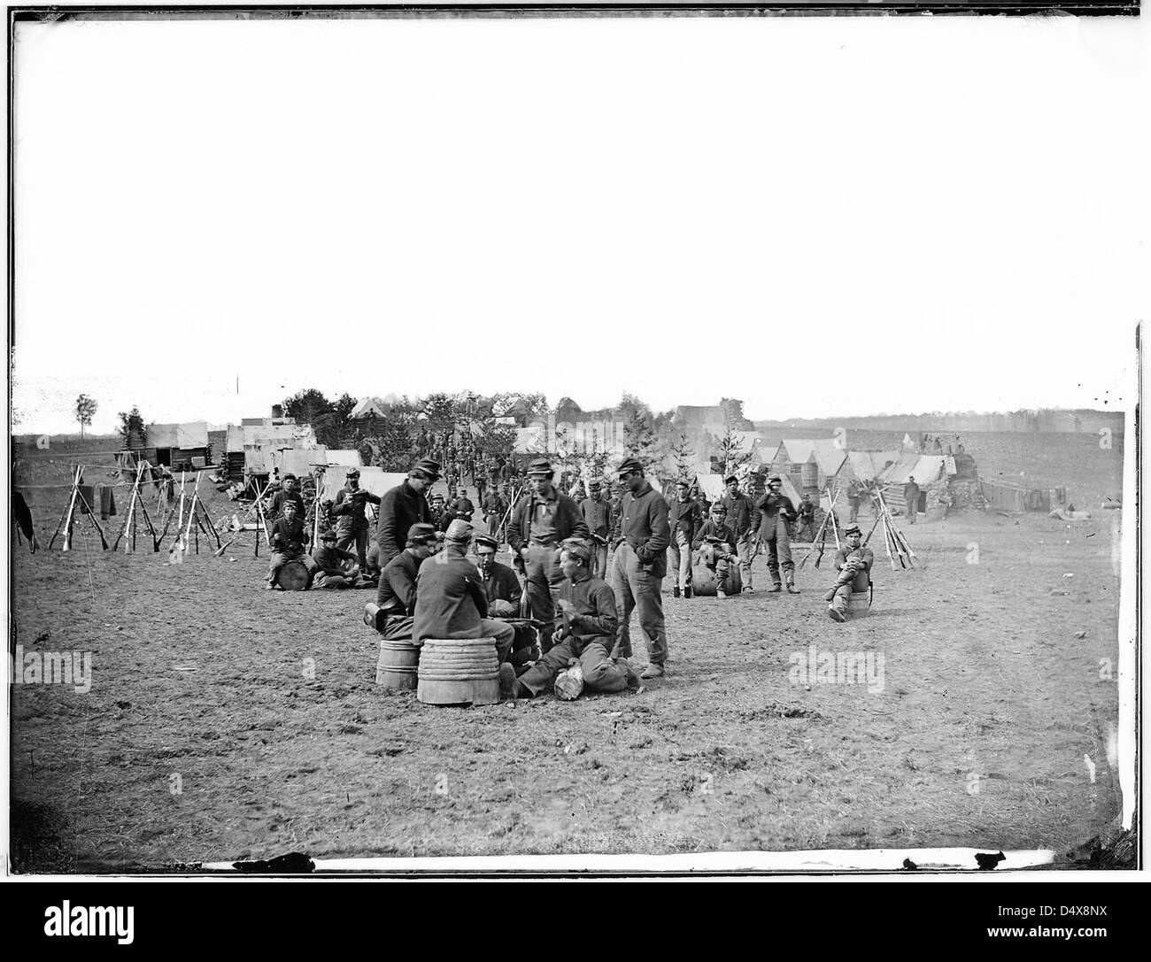 A Civil War camp scene captured by Mathew Brady, showcasing soldiers in ...