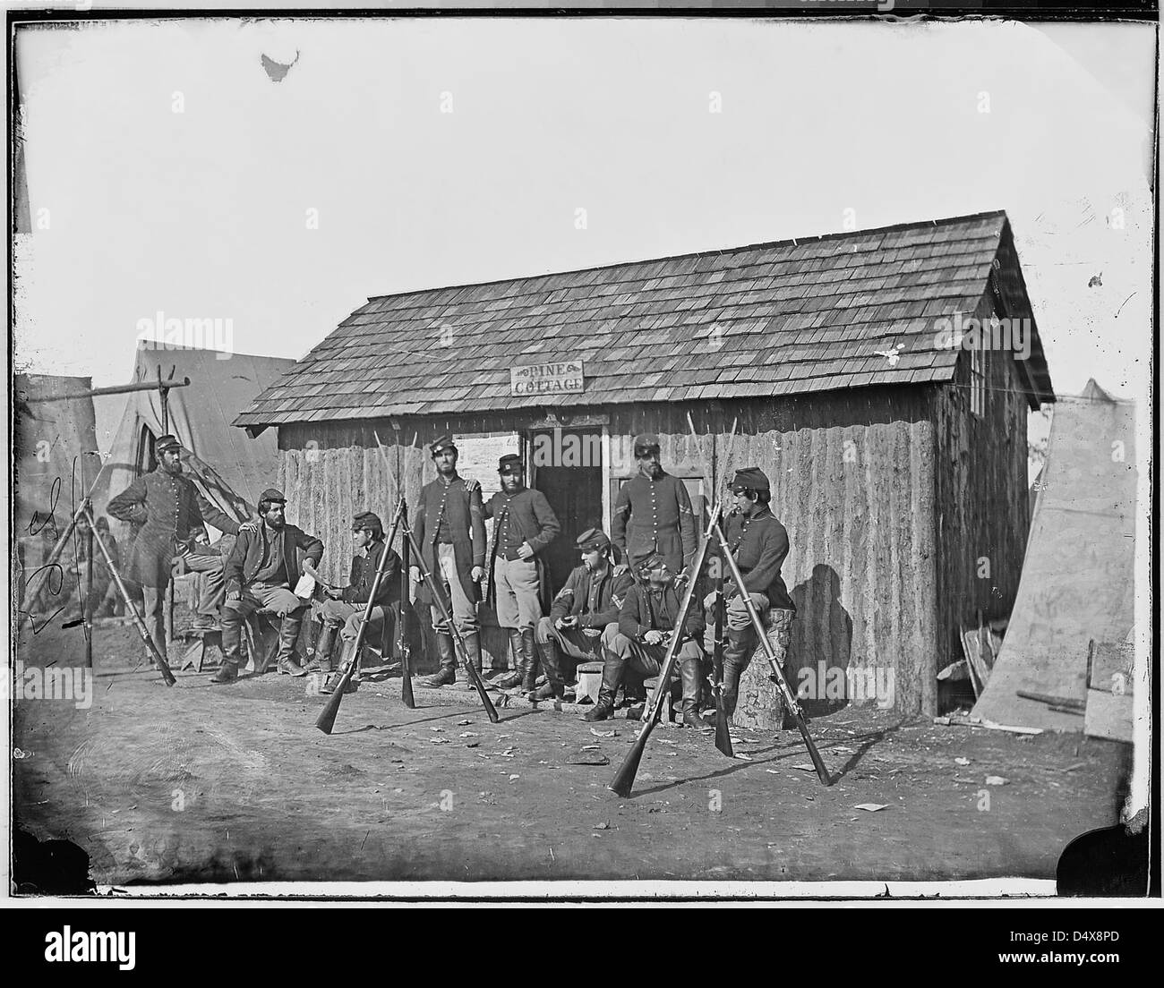 This photograph by Mathew Brady depicts Pine Cottage, the winter ...