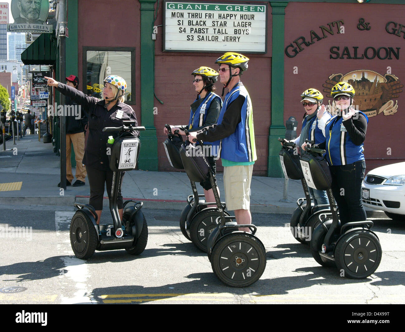 tour guide leads tourists on segway ride through North Beach in San ...