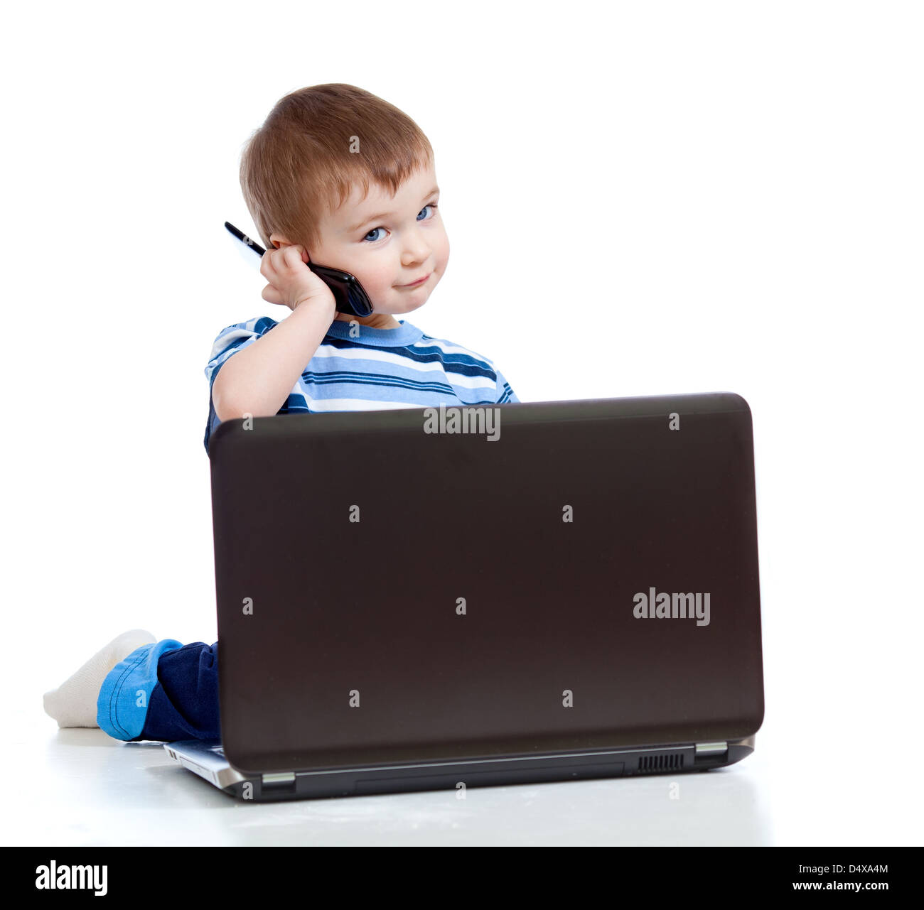 Child with laptop and mobile phone Stock Photo - Alamy