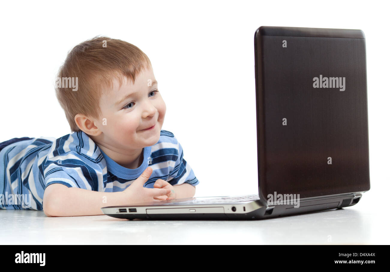Child using a laptop Stock Photo - Alamy