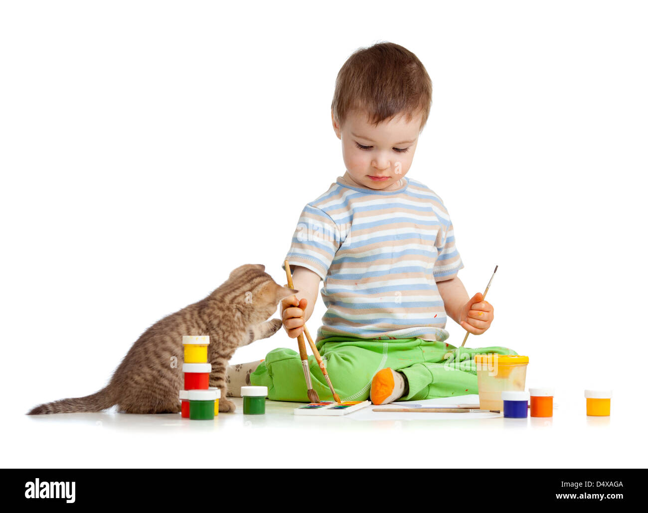 kid drawing paints with cat Stock Photo - Alamy