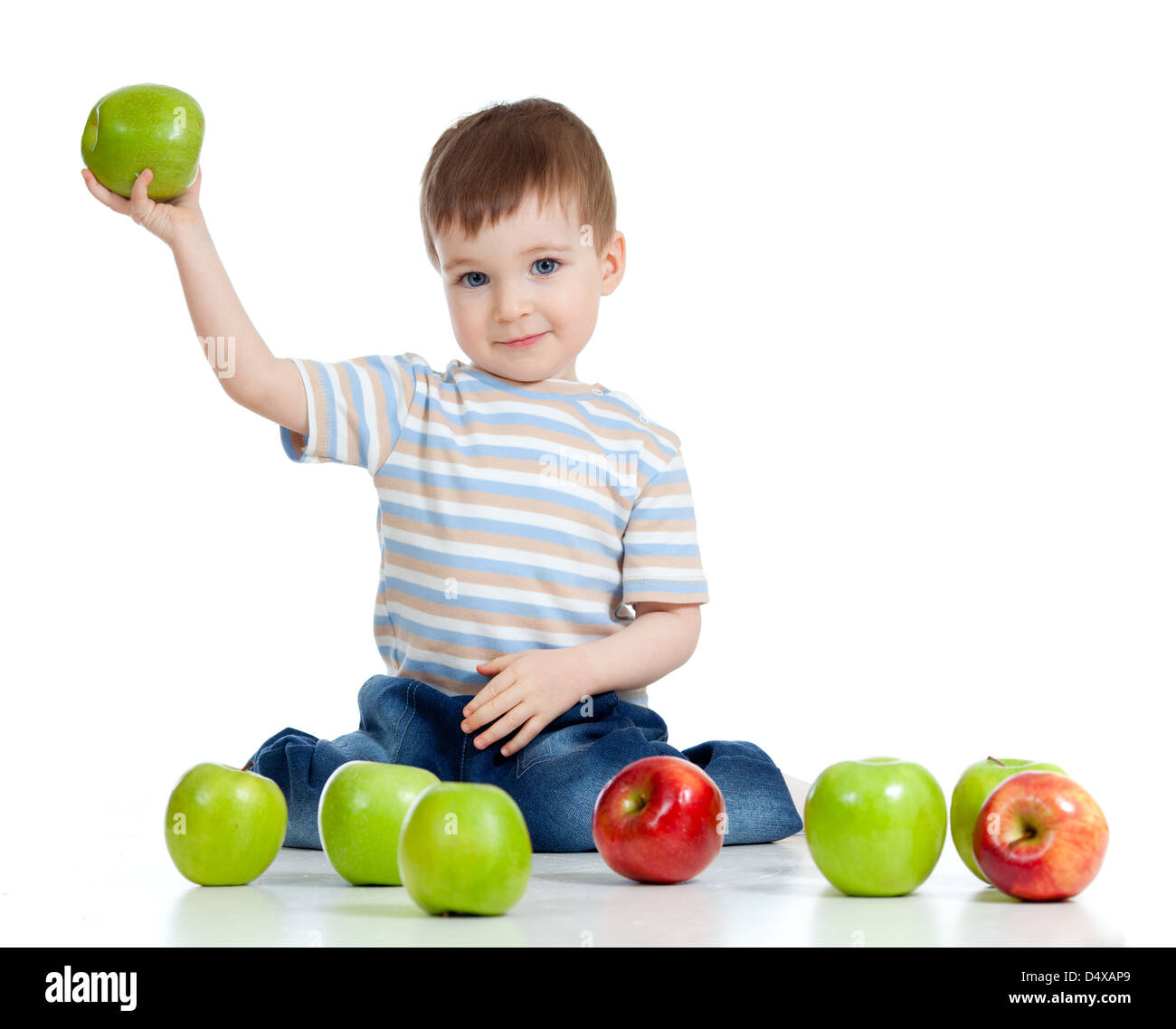 adorable child holding green apple Stock Photo - Alamy