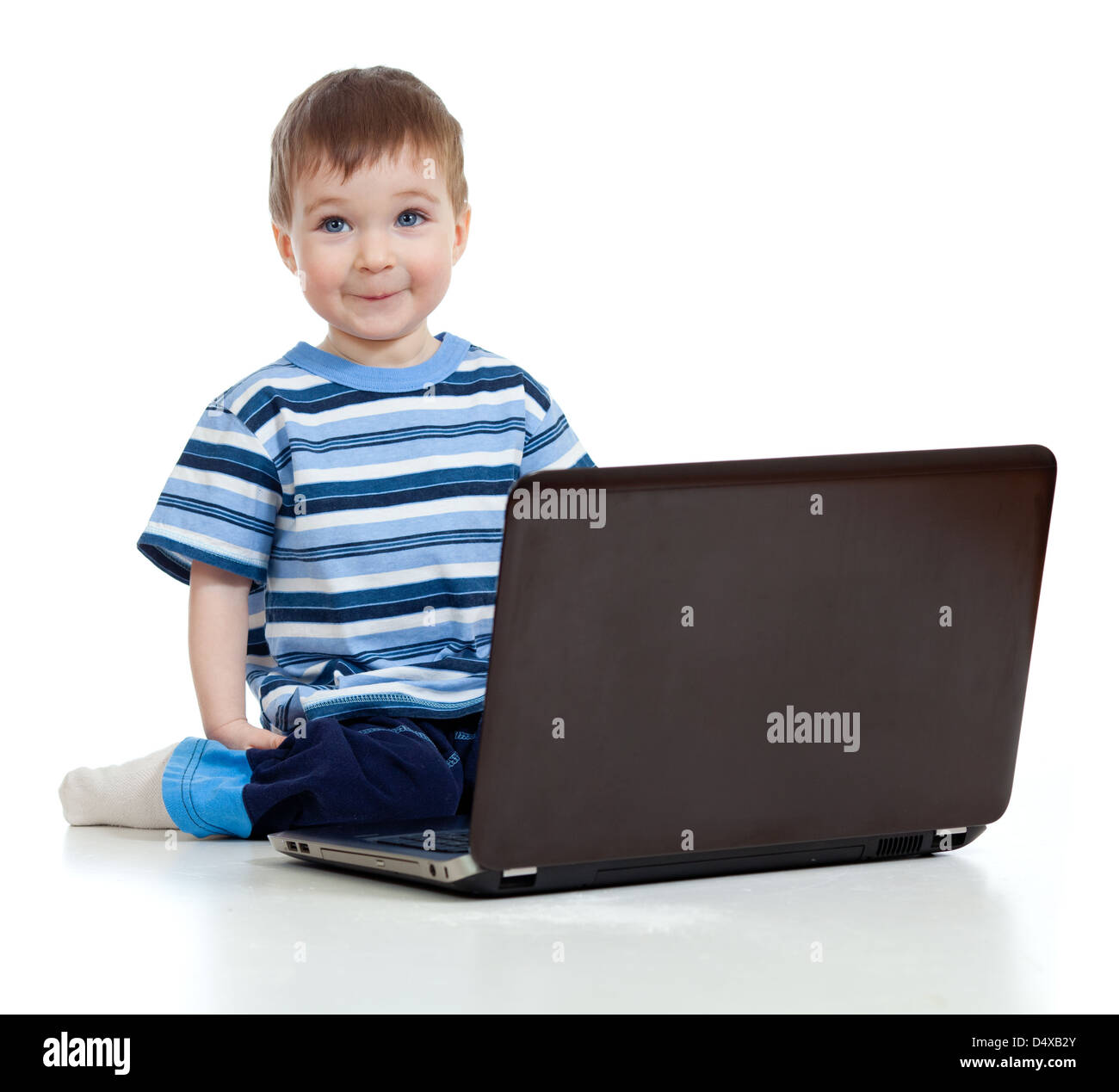 Child using a laptop Stock Photo - Alamy