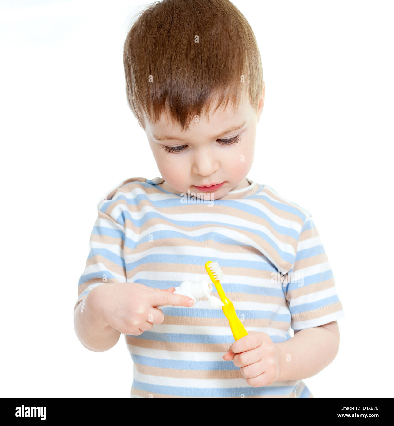 baby cleaning teeth, isolated on white background Stock Photo - Alamy
