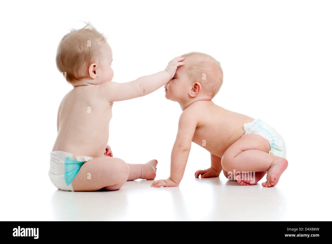 Two funny little children. Isolated on white background Stock Photo - Alamy