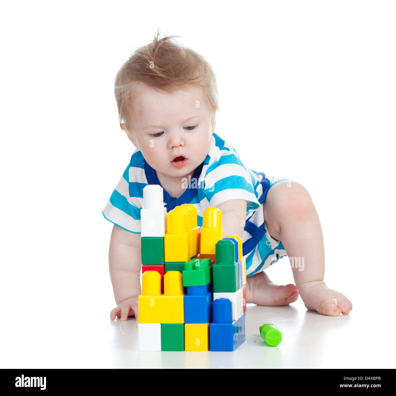 cheerful child boy with construction set over white background Stock ...