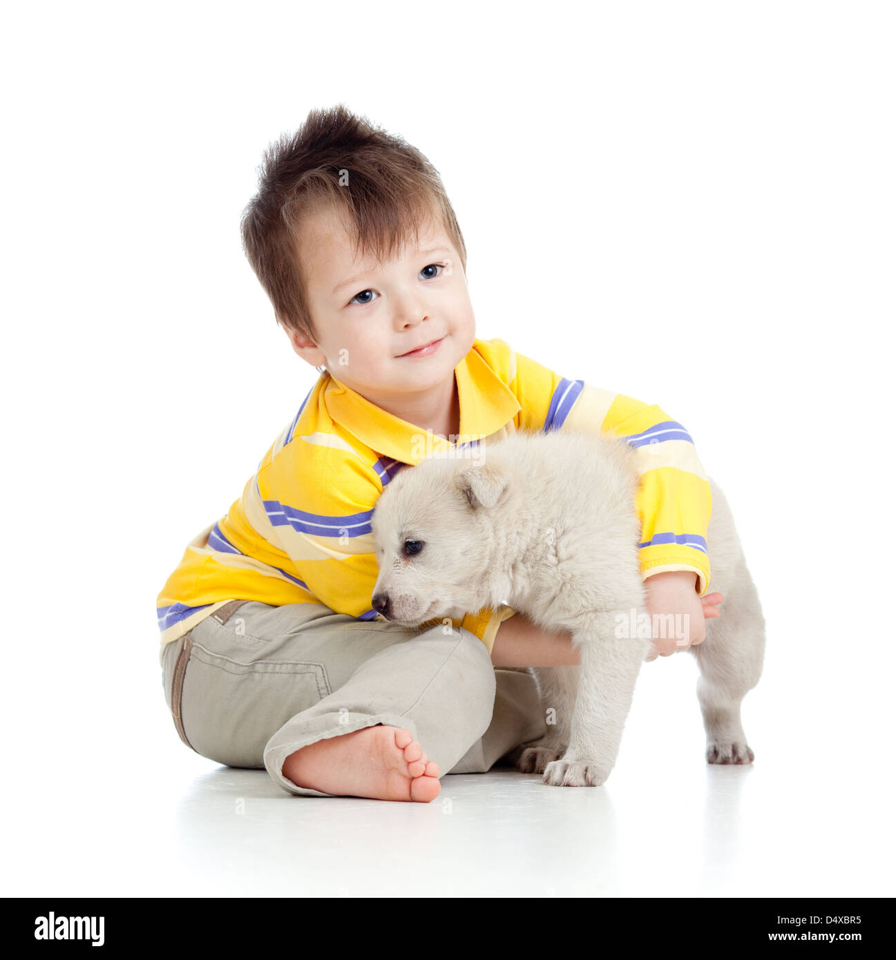 happy kid playing and hugging puppy dog Stock Photo - Alamy