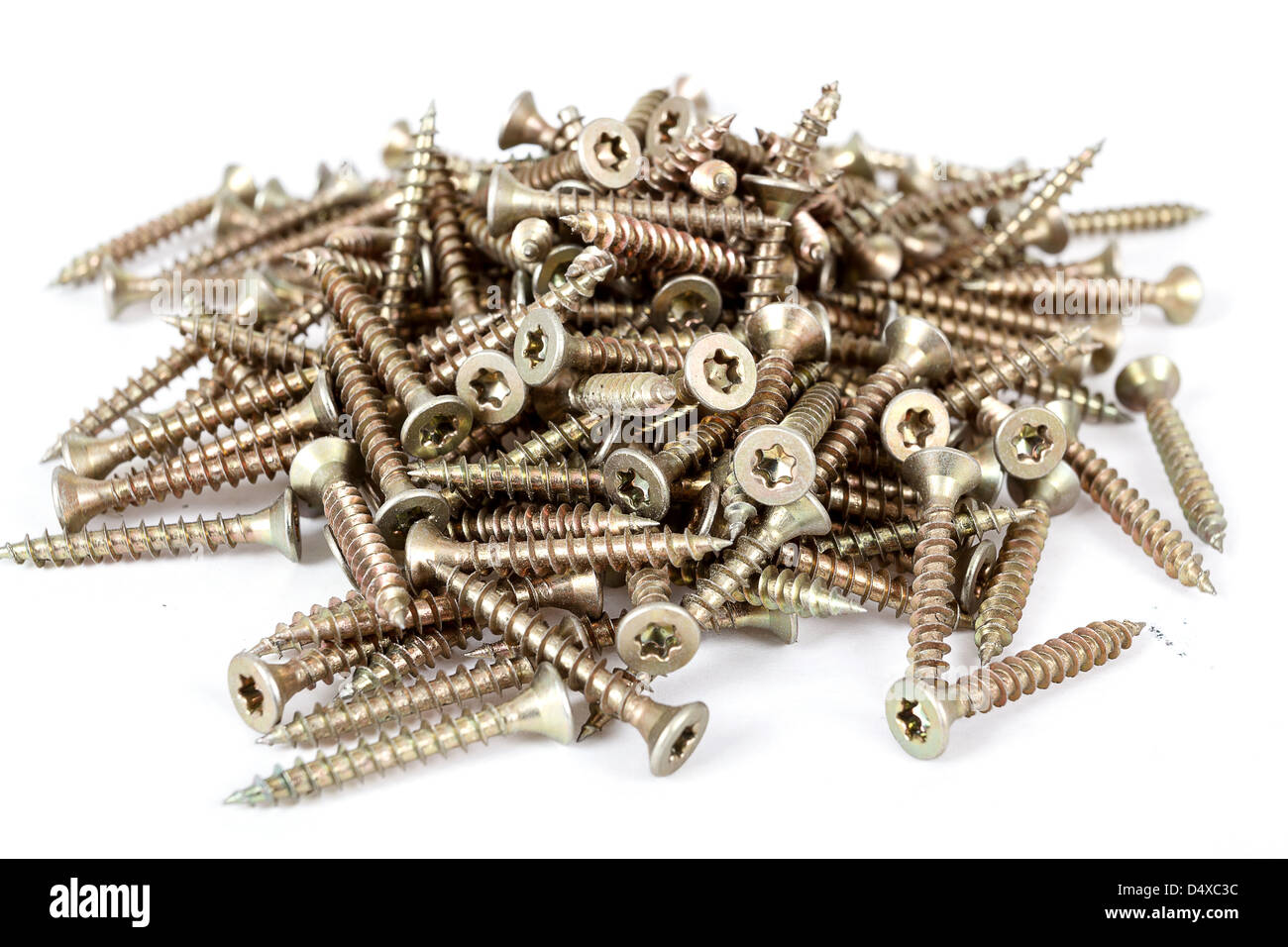 Closeup pile of screw for wood on white background Stock Photo - Alamy