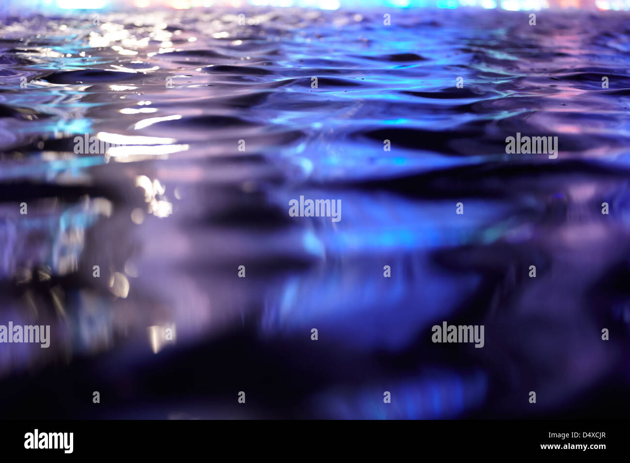 Blue and violet water surface Stock Photo - Alamy