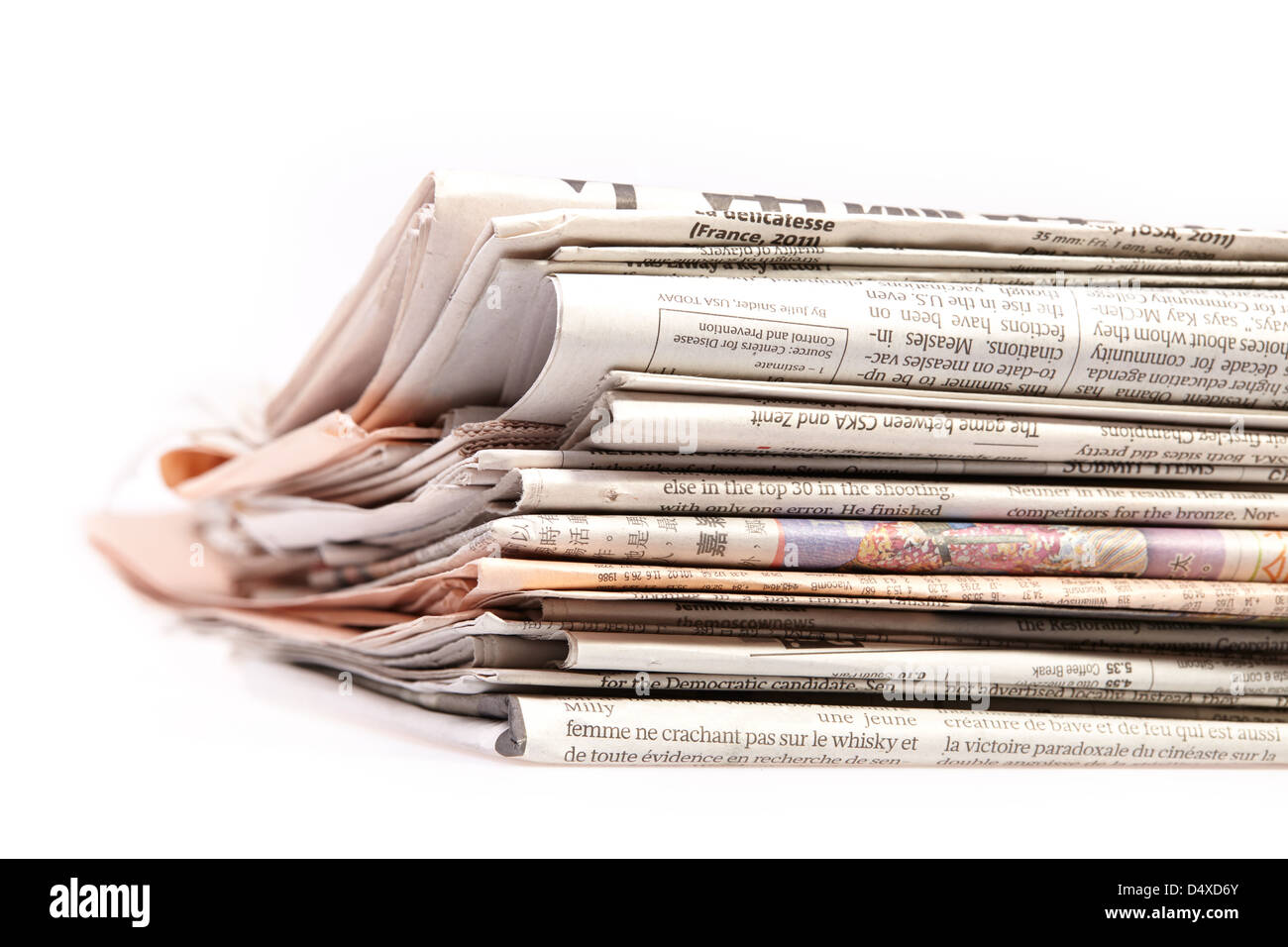 International newspapers on white Stock Photo - Alamy