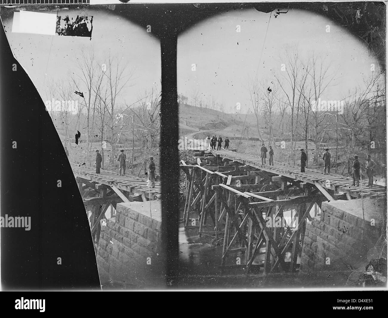 A historical photograph of a railroad bridge from the Civil War era ...