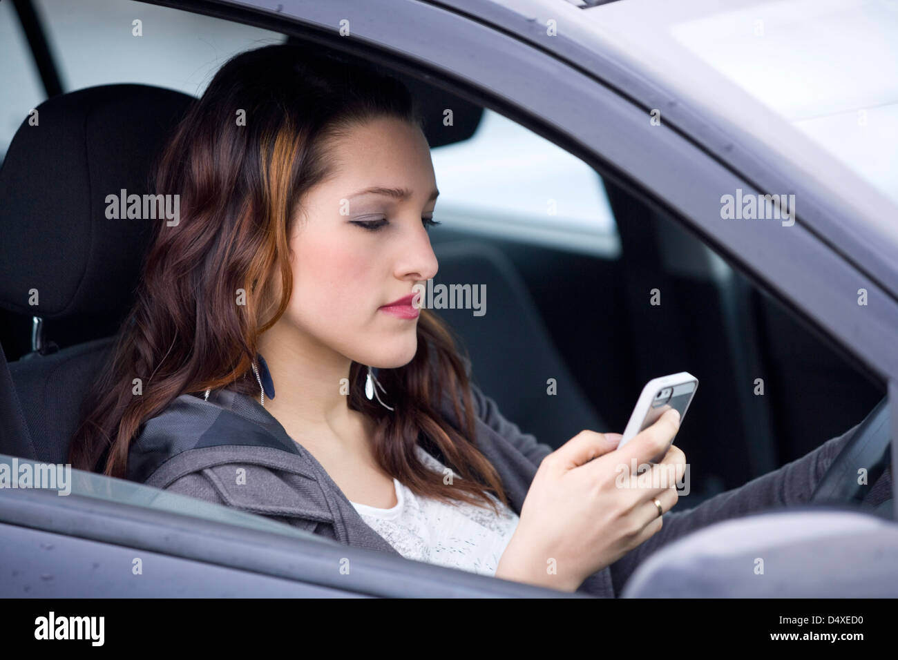 Woman Multitasking While Driving Stock Photos & Woman Multitasking ...