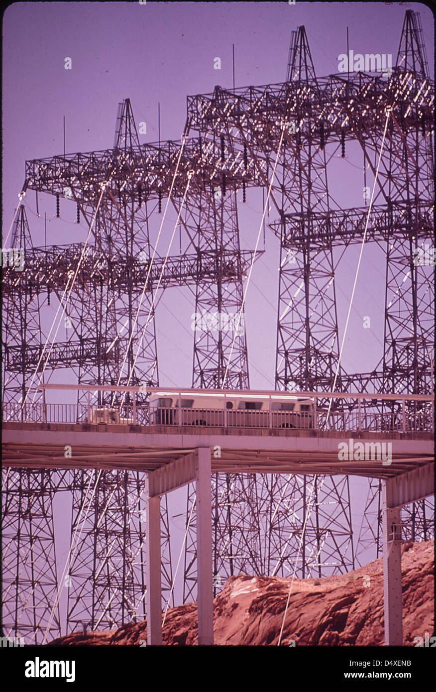A photograph featuring a power line crossing a landscape, taken by the ...