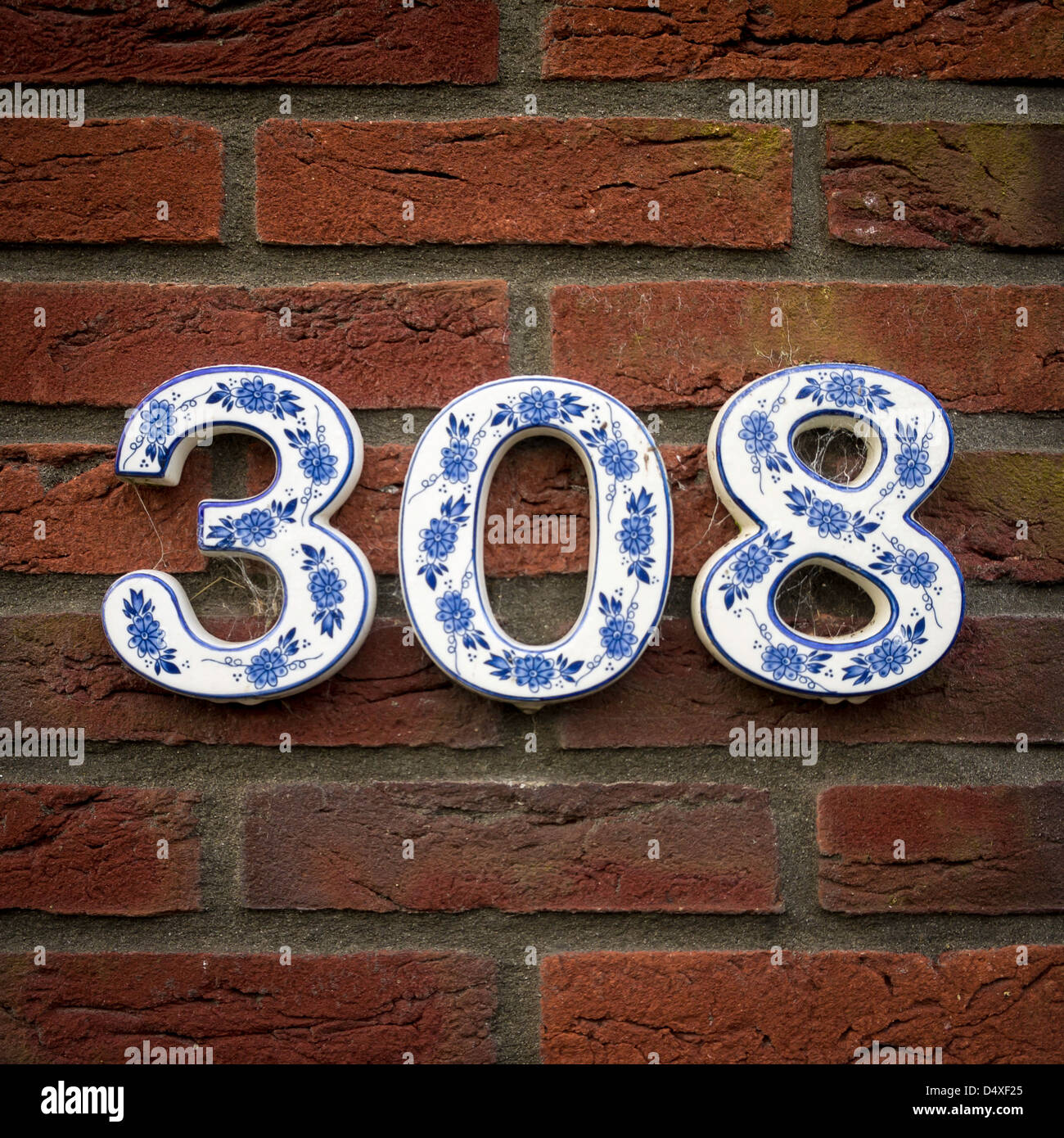 house number three hundred and eight, made out of delft blue porcelain Stock Photo - Alamy