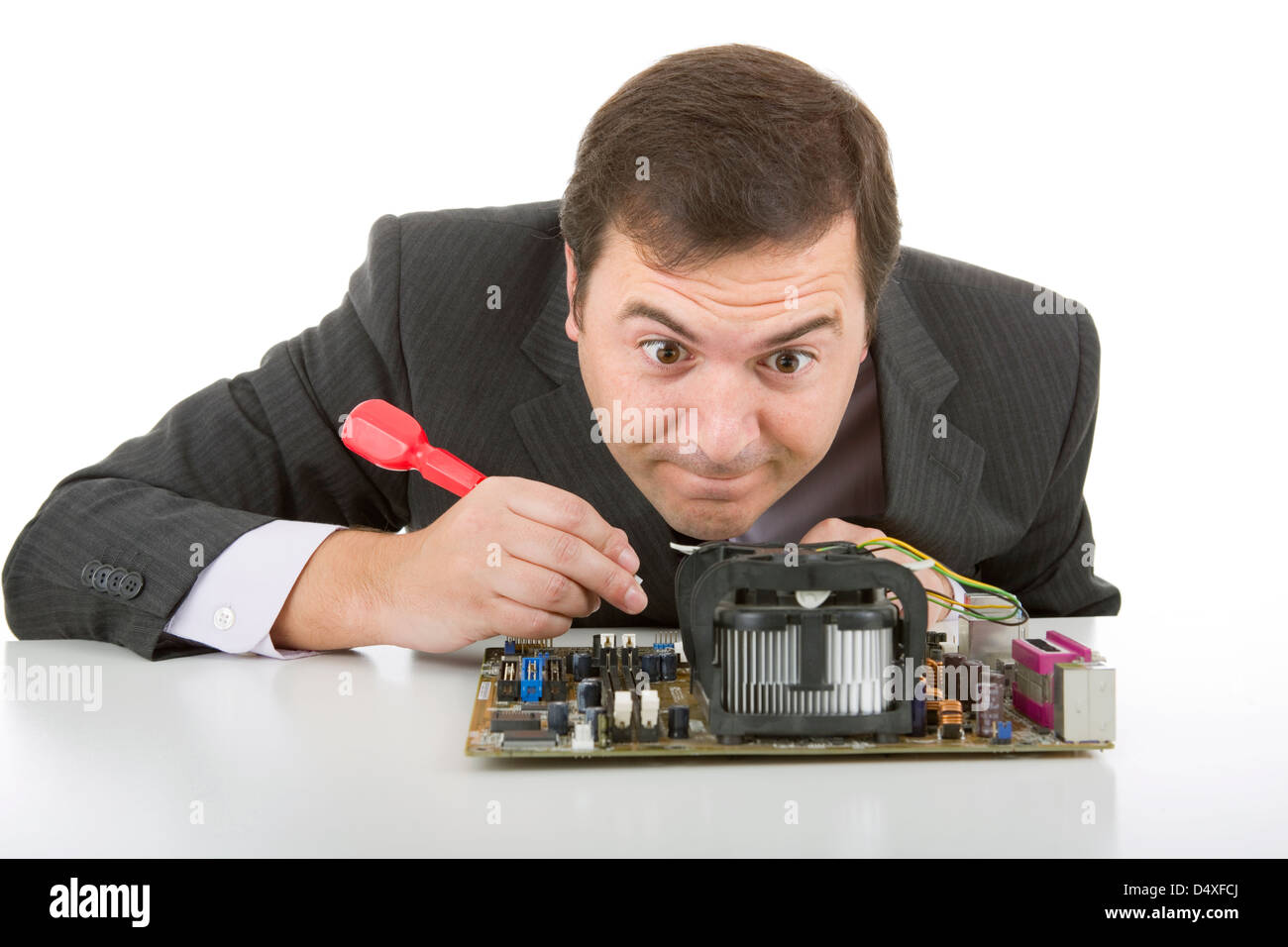 Computer Engineer working in a motherboard, isolated Stock Photo - Alamy