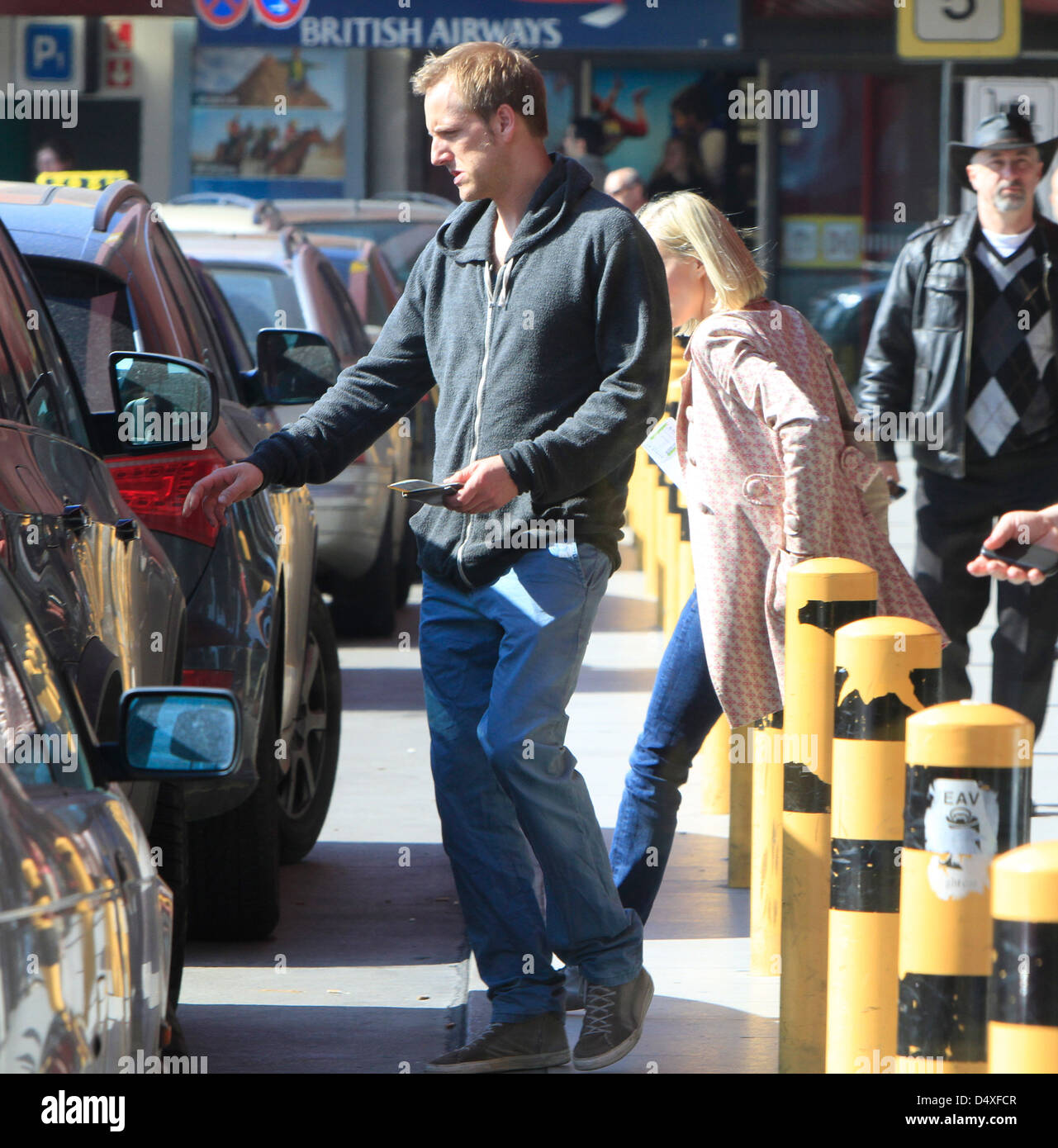 Jan Hahn seen at Tegel airport with an unidentified female who has a ...