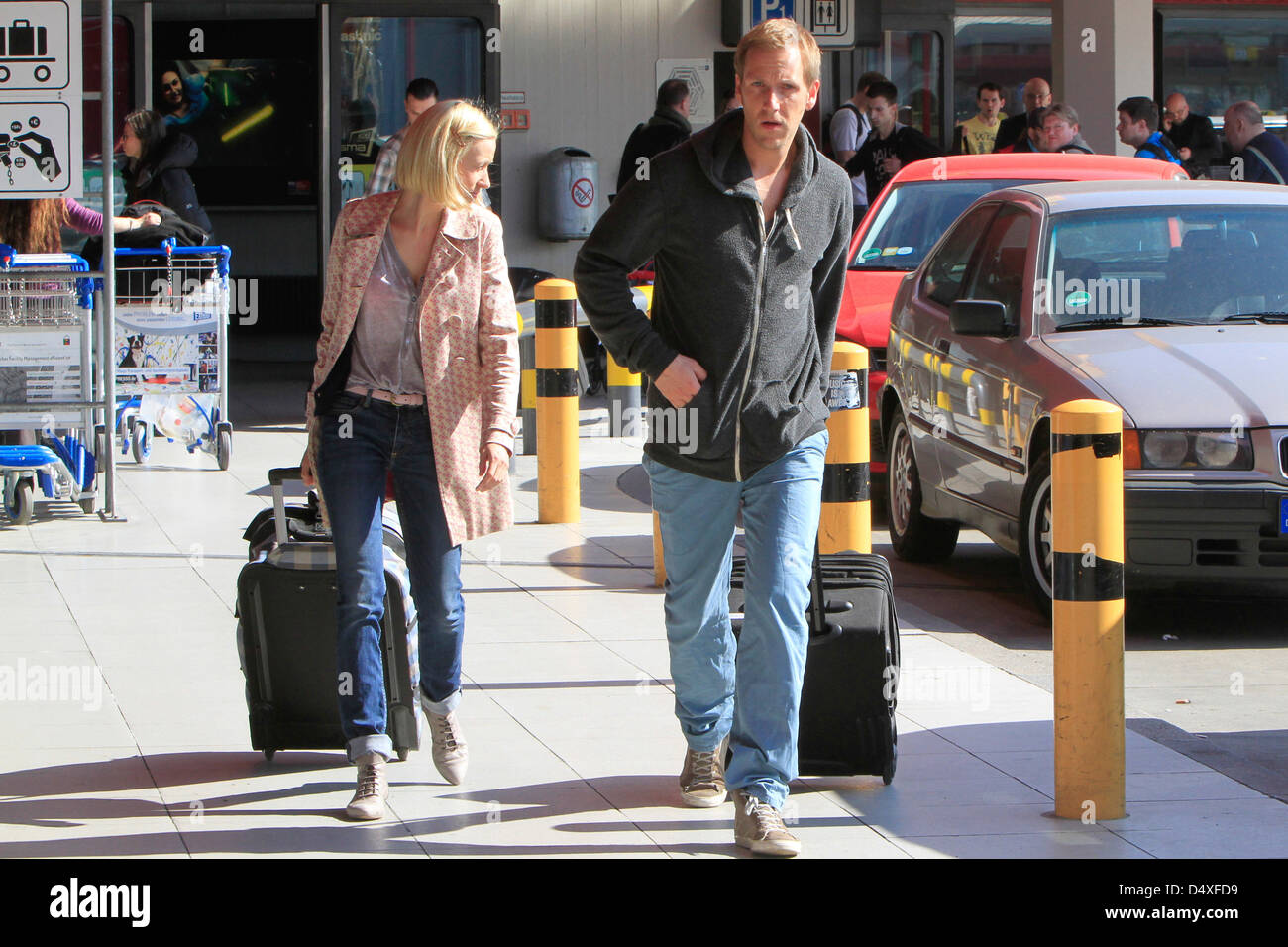 Jan Hahn seen at Tegel airport with an unidentified female who has a ...