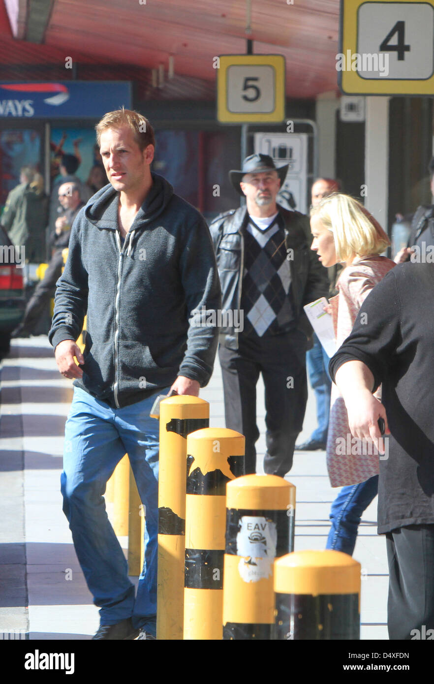 Jan Hahn seen at Tegel airport with an unidentified female who has a ...