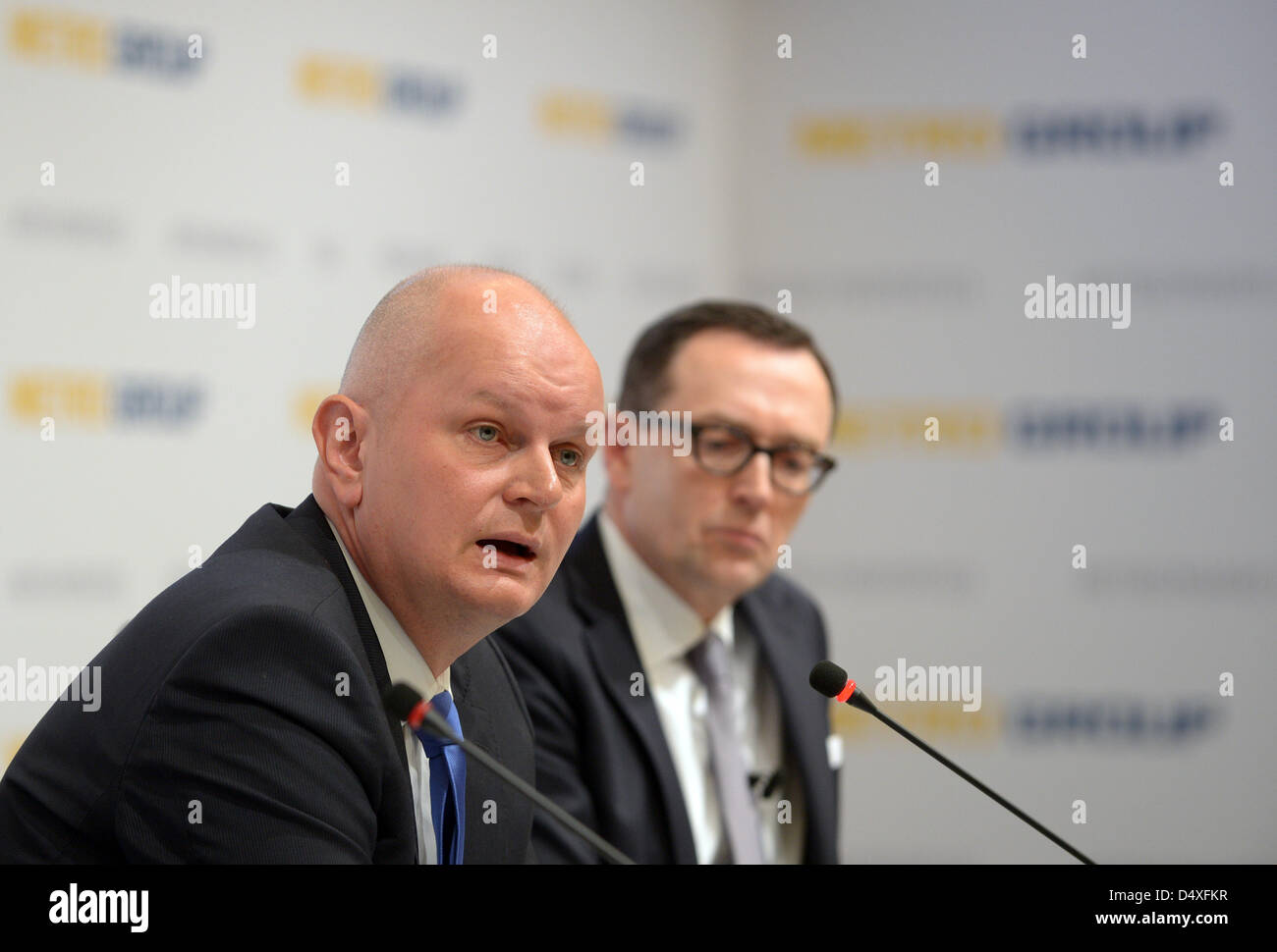 Metro CEO and Chairman of the management board, Olaf Koch (L) and CFO ...