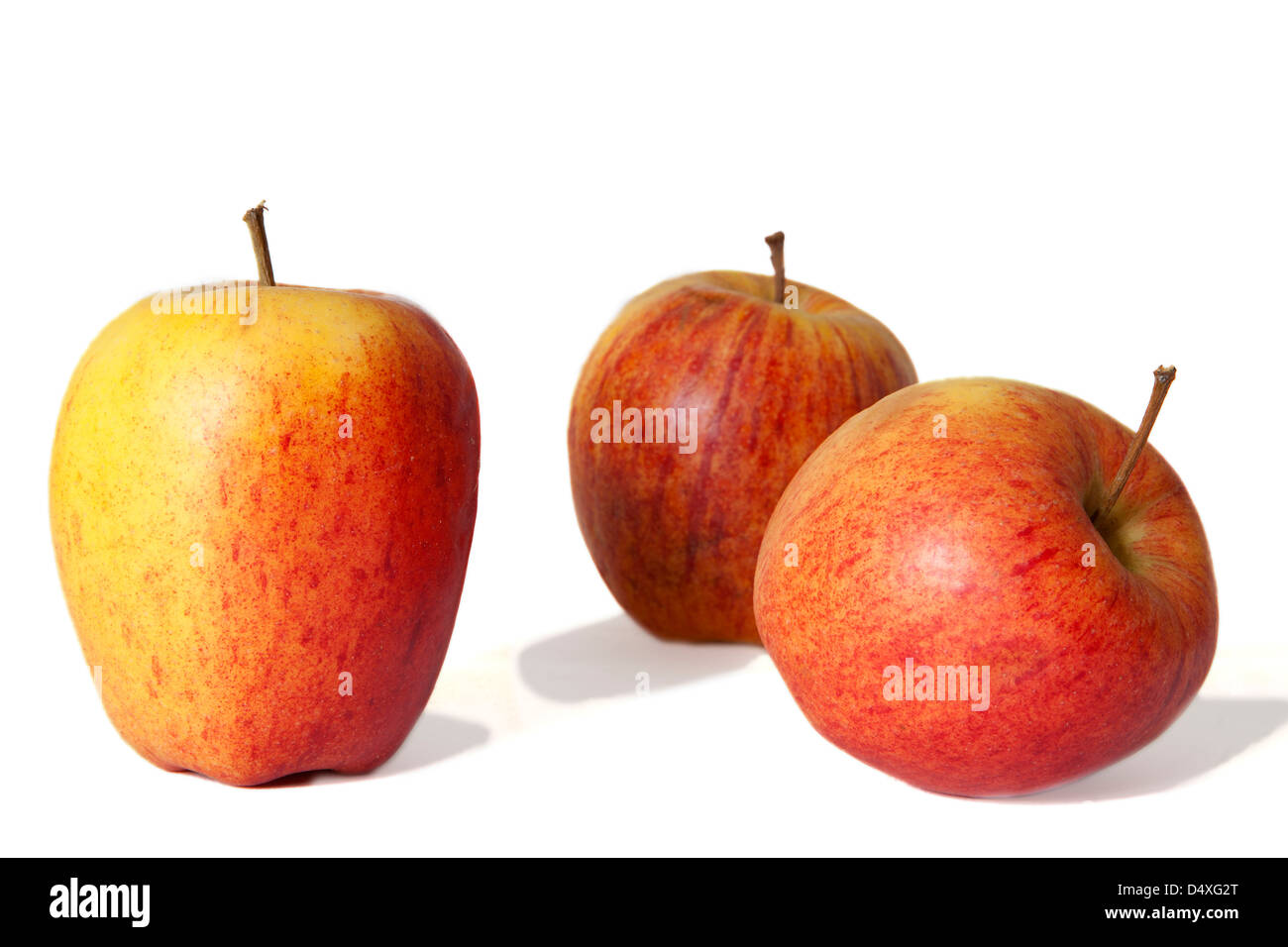 Three red apples isolated on white Stock Photo - Alamy
