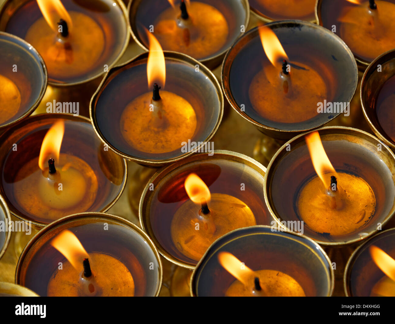 Butter lamps in a buddhist monastery in Kathmandu, Nepal Stock Photo ...
