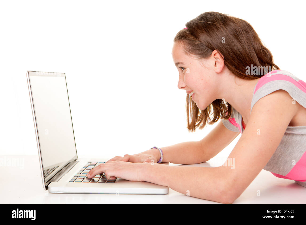 kid or teen using Internet laptop computer Stock Photo - Alamy
