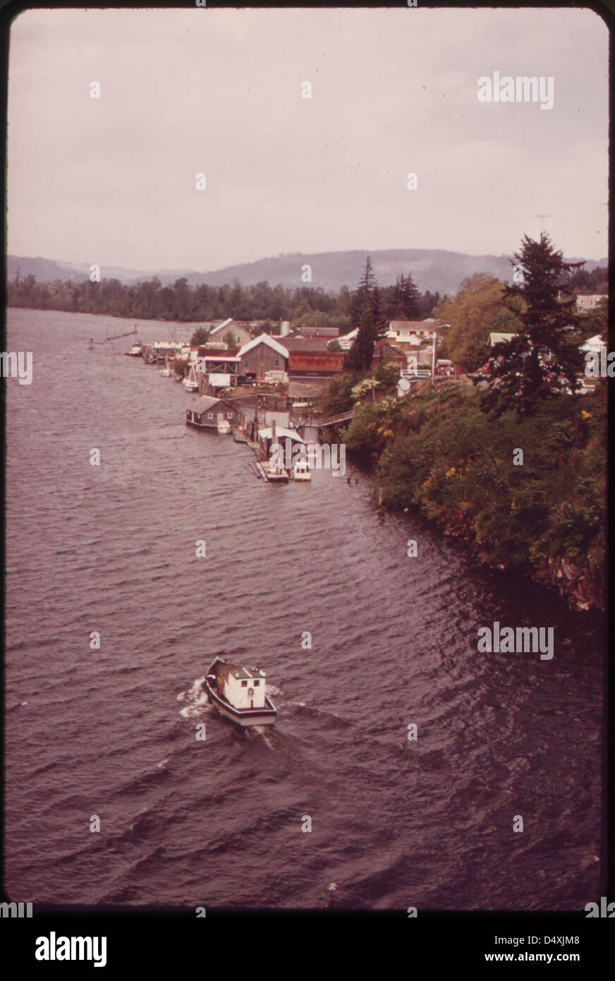 A photograph from May 1973 depicting the small riverside town of ...