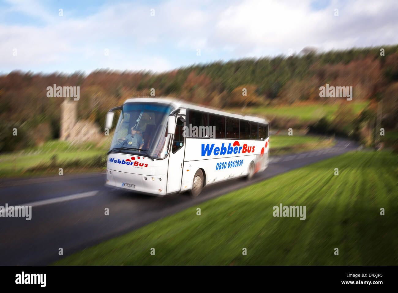 A Webber coach traveling along the A39 at west Quantoxhead, Somerset in ...