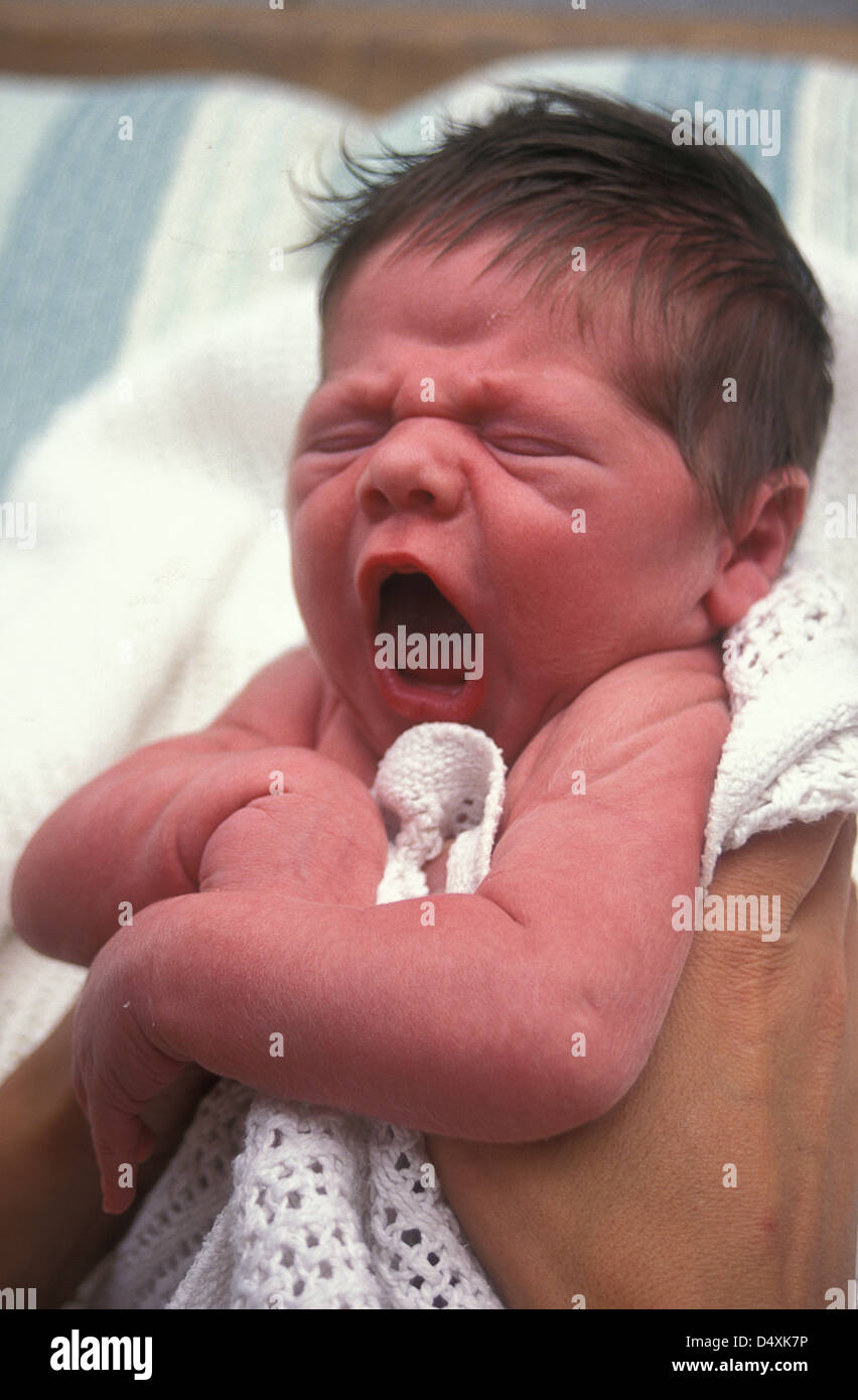 newborn baby yawning Stock Photo - Alamy