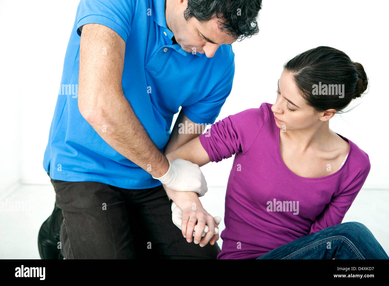 Woman first aid hi-res stock photography and images - Alamy