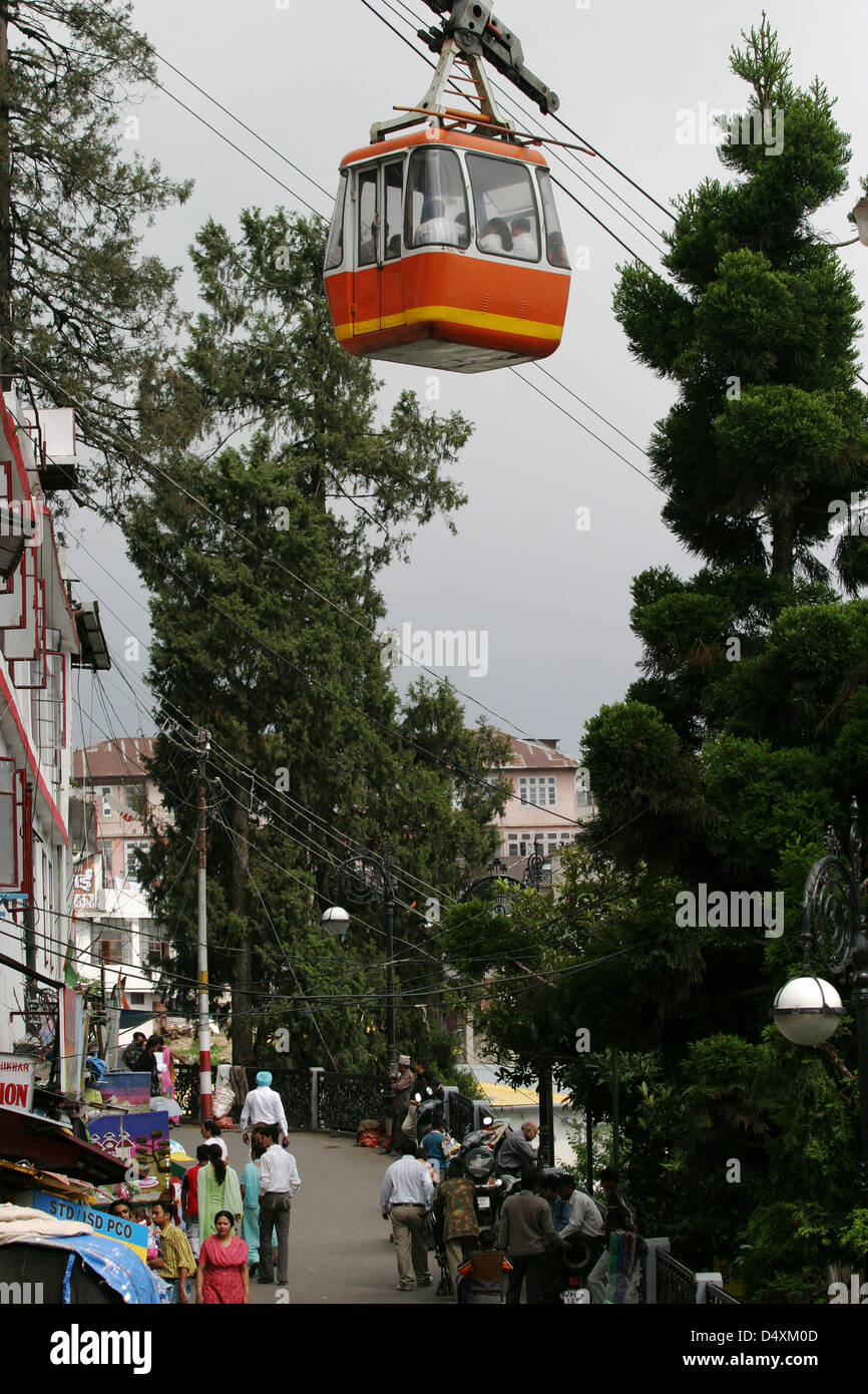 The cable car to Gun Hill crosses Gandhi Chowk in Mussoorie Stock Photo ...