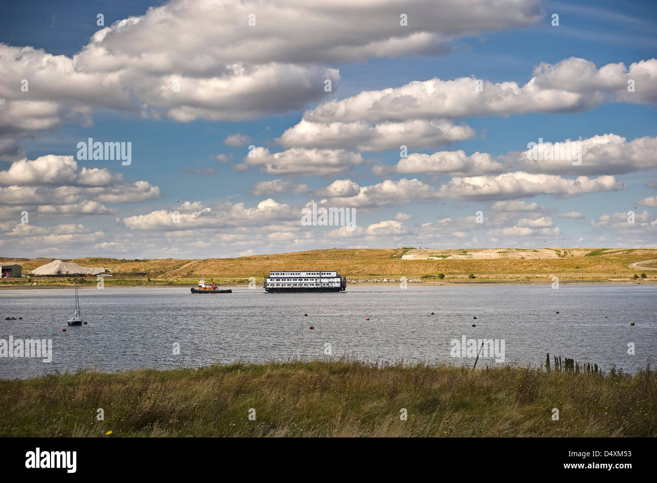 Ship navigating down the River Thames near Erith, Kent, UK Stock Photo ...