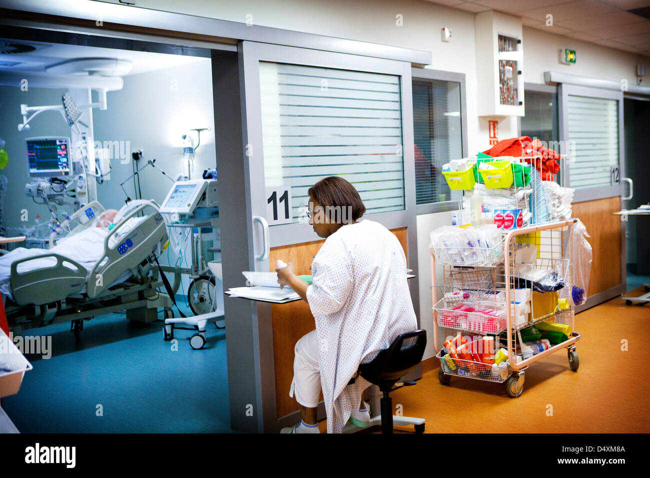 Woman In Intensive Care Unit High Resolution Stock Photography and ...