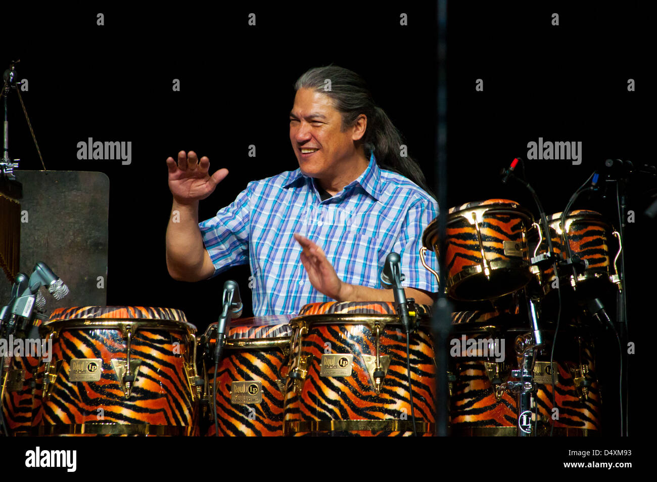 Carlos Santana's band: Raul Rekow. Carlos Santana concert Crocus City ...