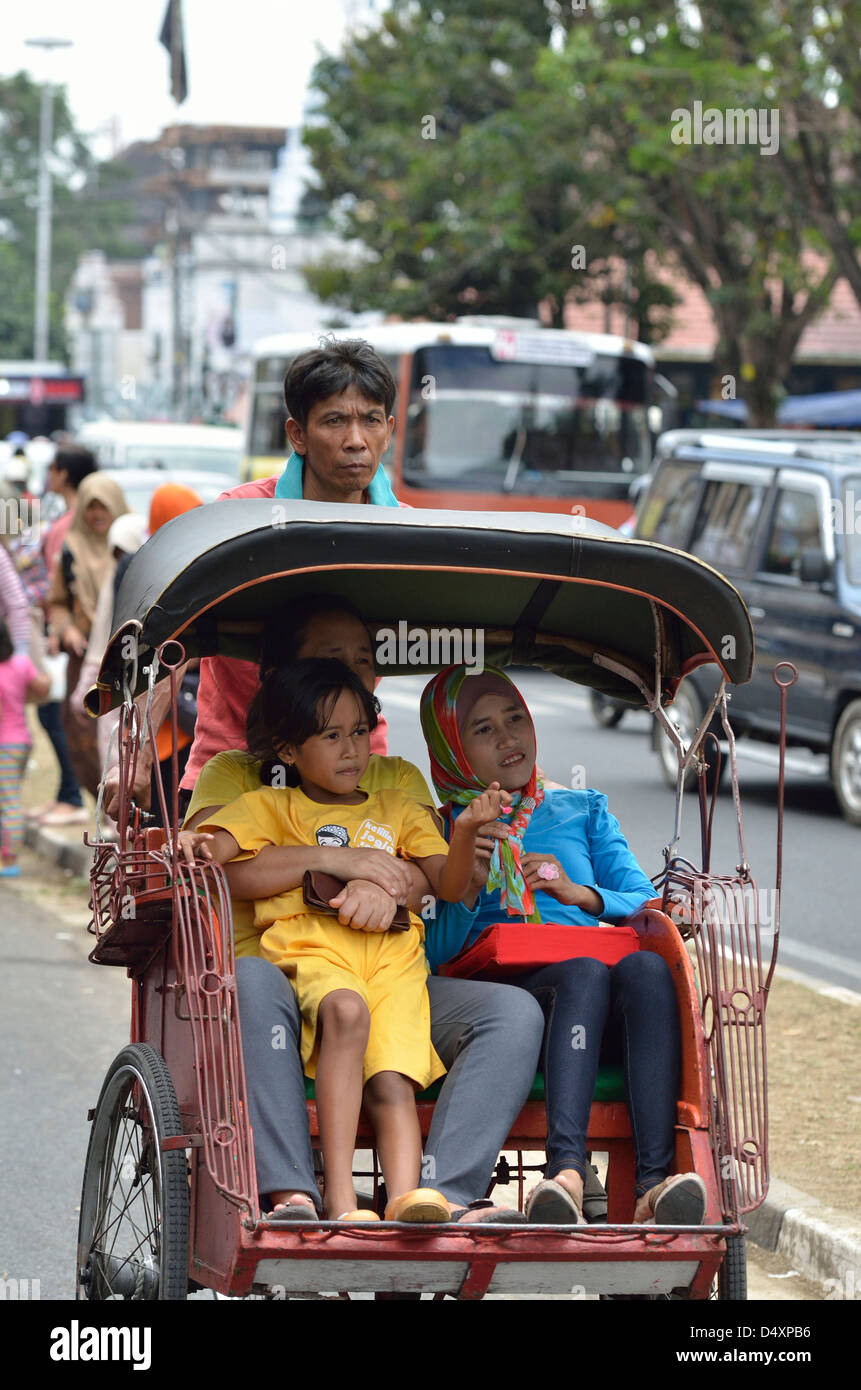 A becak in the Malioboro avenue in Yogyakarta; Central Java, Indonesia ...