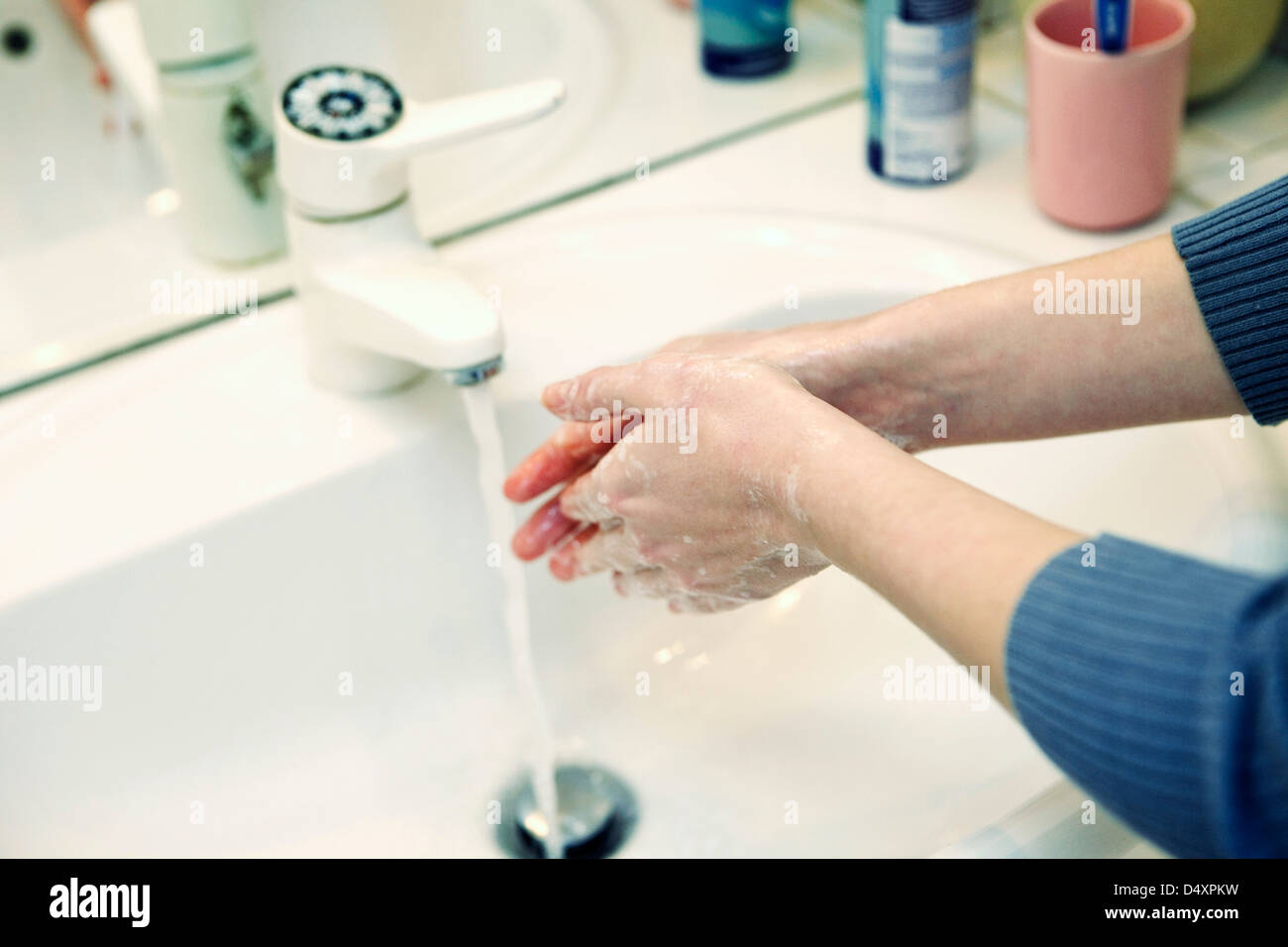 HAND WASHING, WOMAN Stock Photo - Alamy