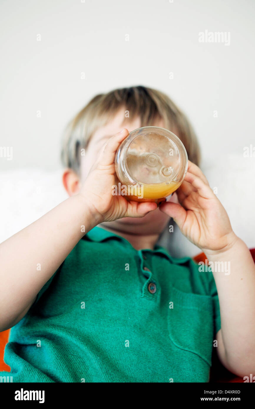 CHILD WITH COLD DRINK Stock Photo - Alamy