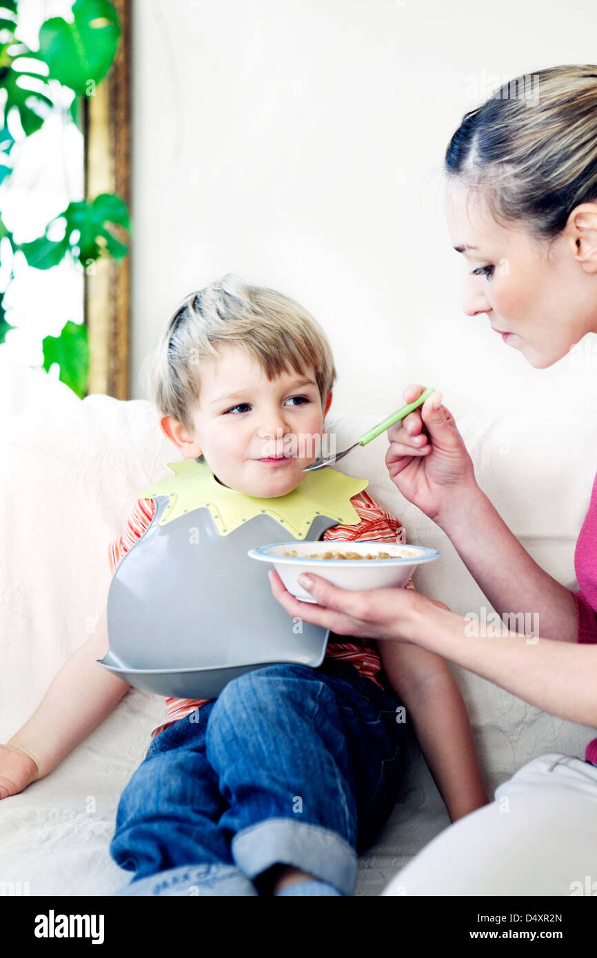 CHILD EATING A MEAL Stock Photo - Alamy